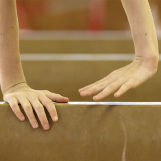 Learn and teach the cartwheel on beam to your gymnasts
