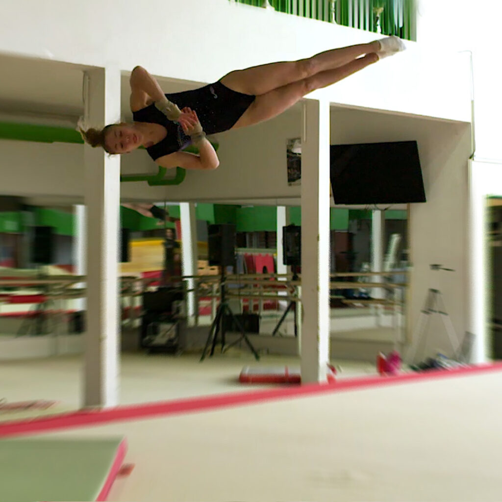 Slow motion videos of the salto bwd stretched with 2/1 turn on the floor