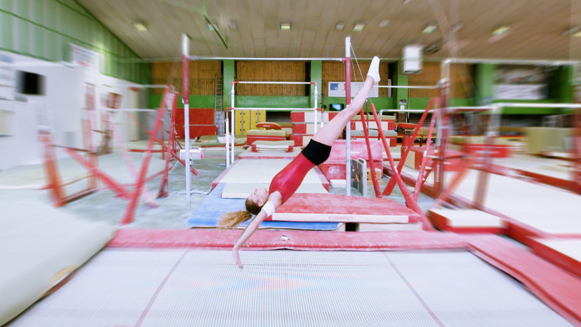Slow motion videos of the back Kaboom to handstand on the trampoline